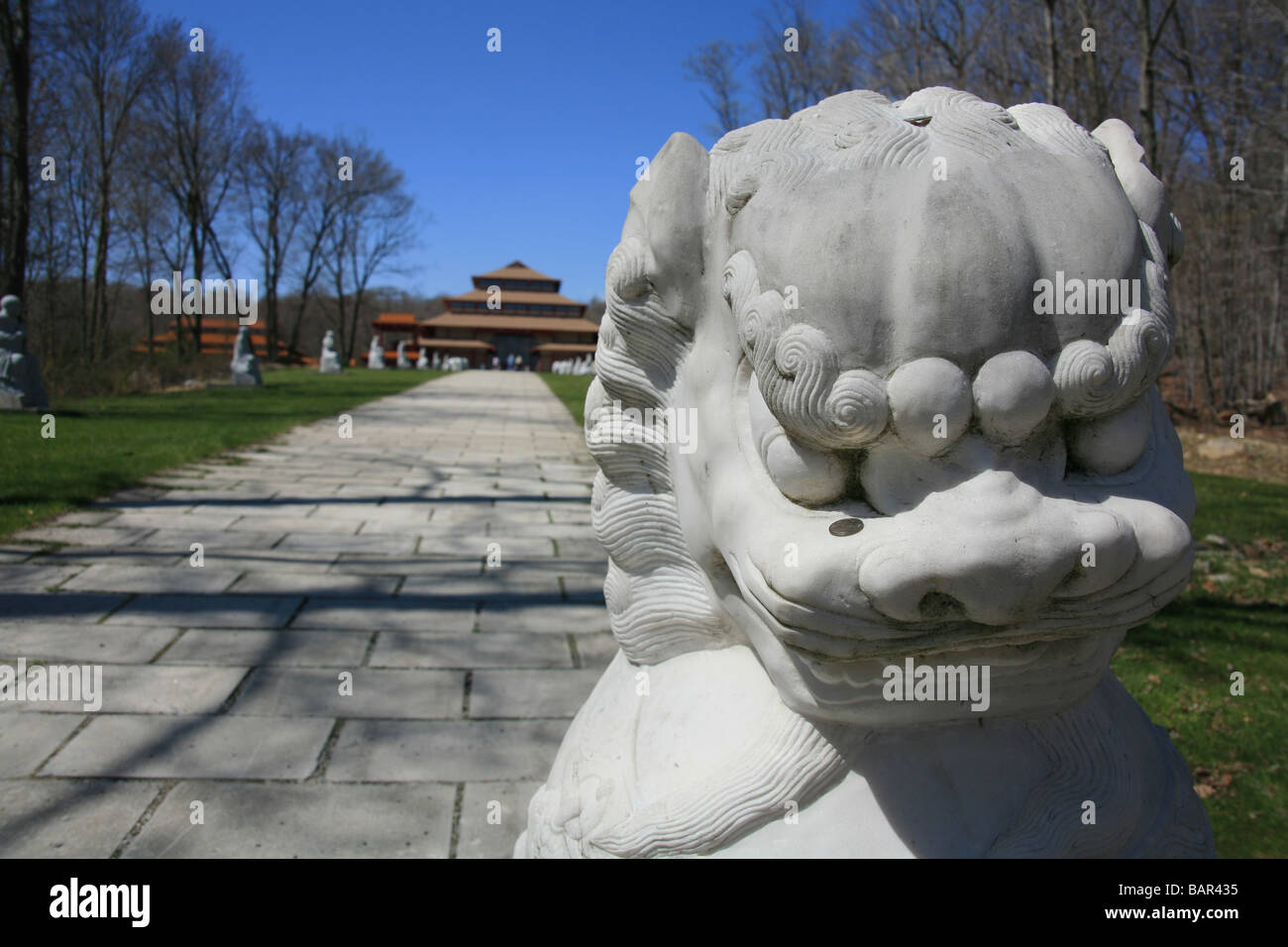 Lion statue at the beginning of the Bodhi Path at the Chuang Yen ...