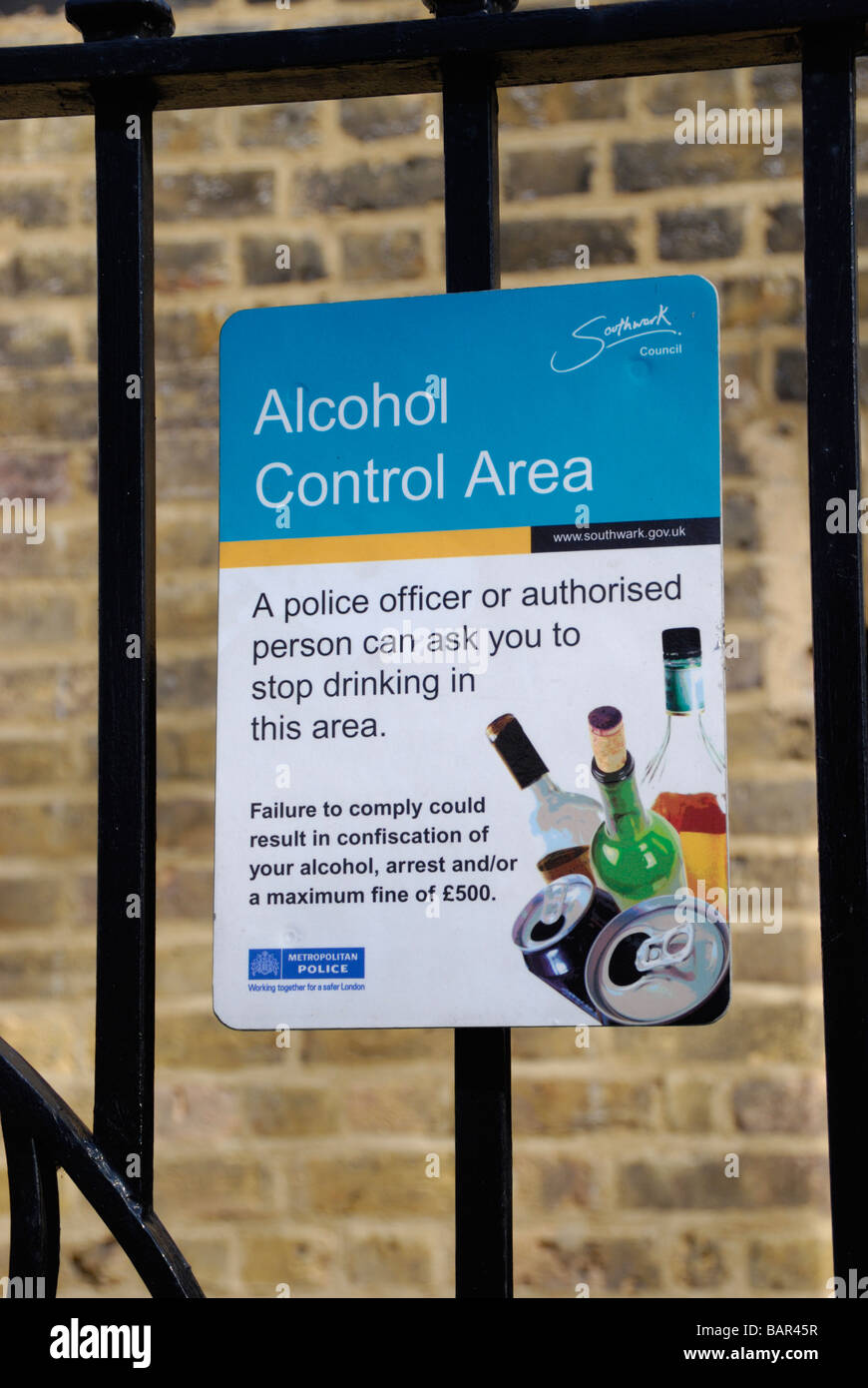 UK police alcohol control area sign on park gate Stock Photo - Alamy