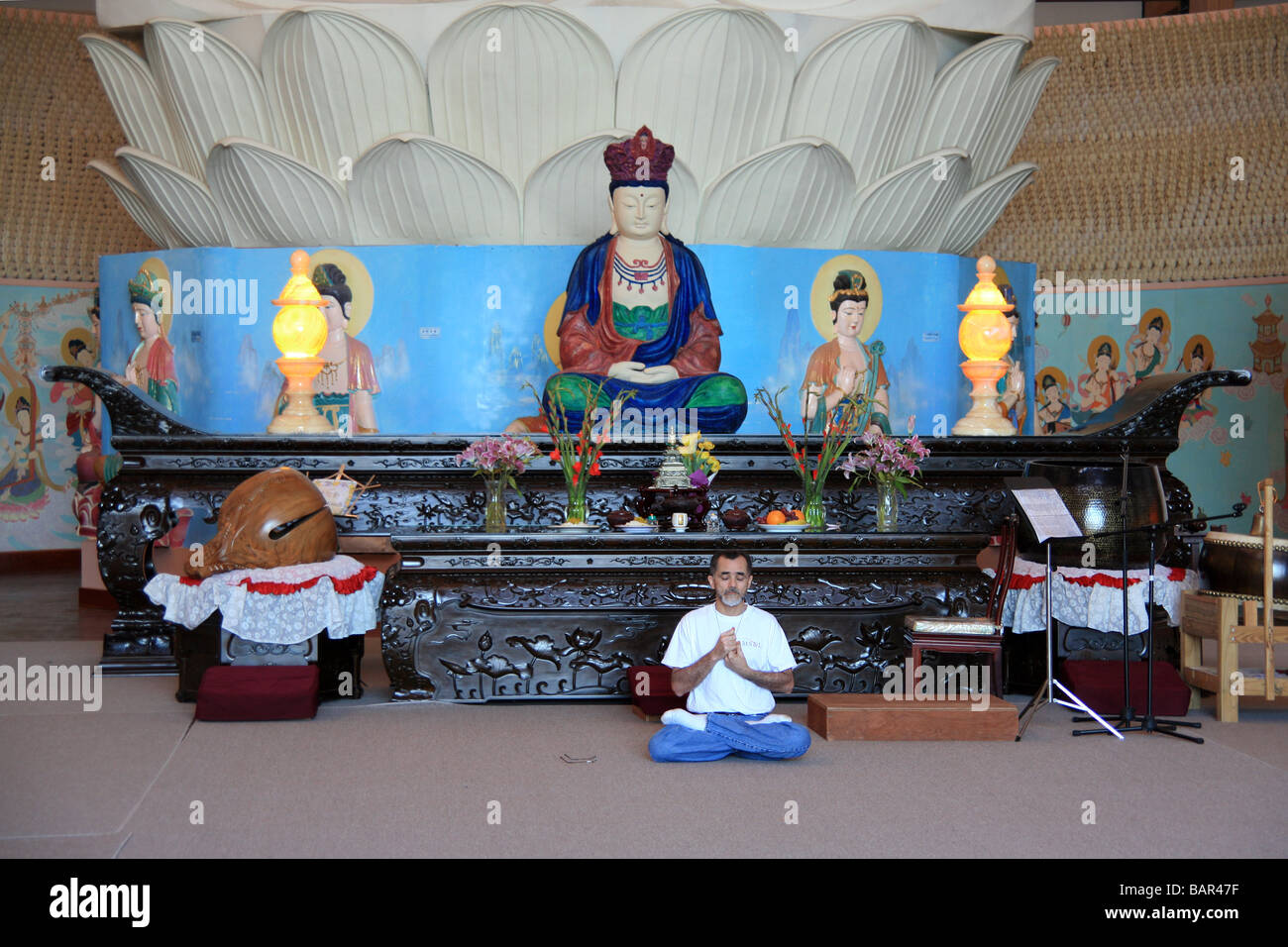 Man meditating in monastery hi-res stock photography and images - Alamy