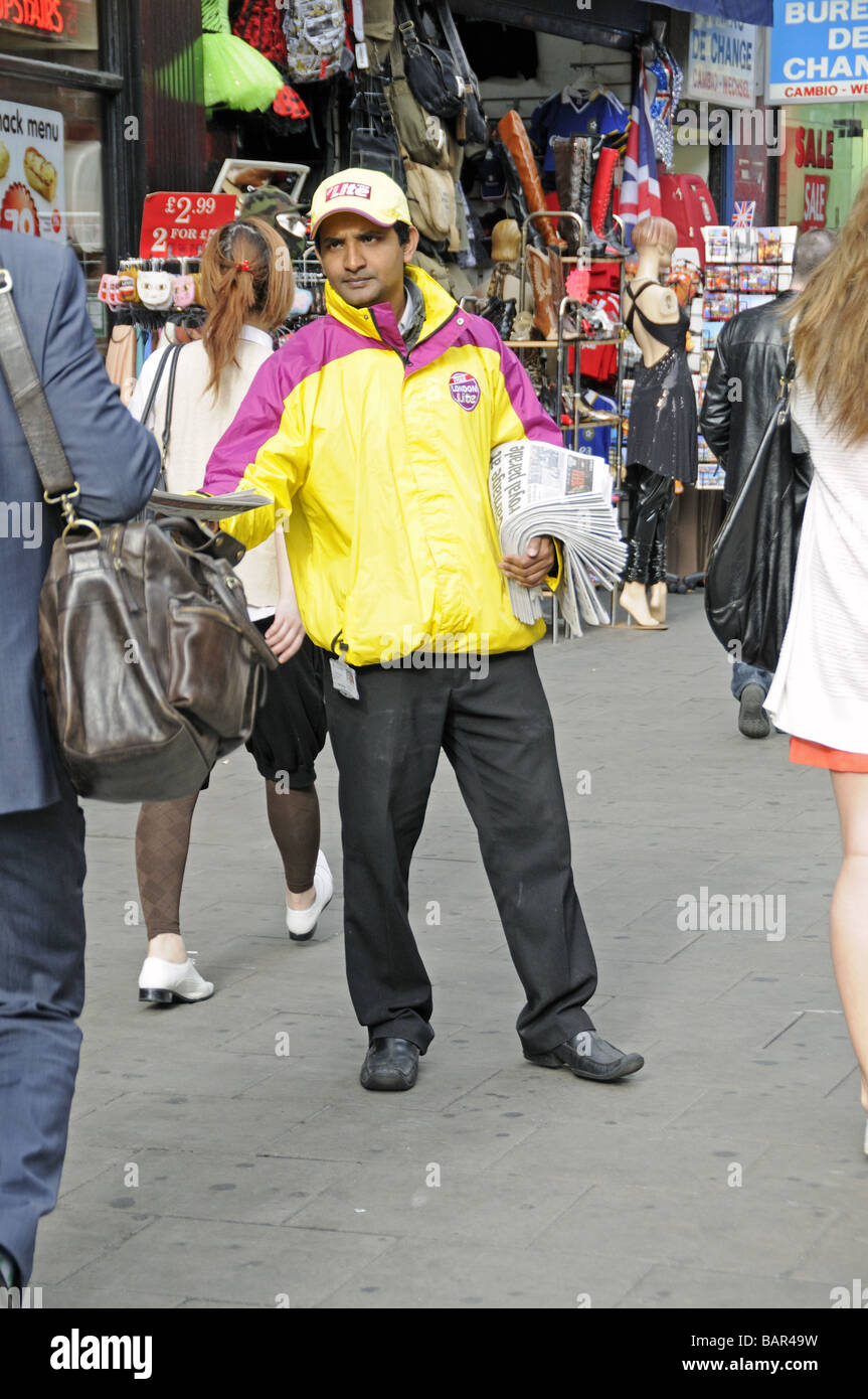 Distributing newspapers hi-res stock photography and images - Alamy