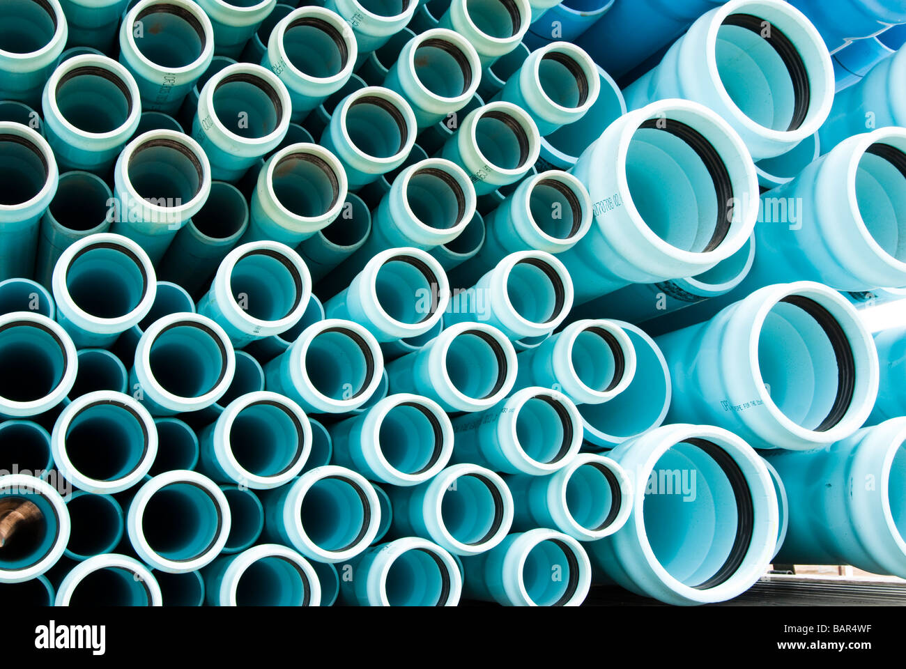 pvc water and sewer pipe being transported to a construction site Stock ...