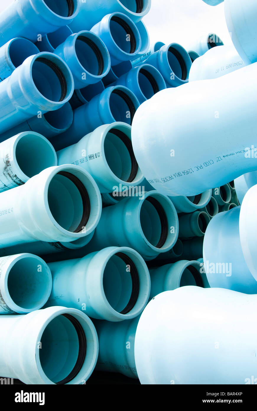 pvc water and sewer pipe being transported to a construction site Stock ...