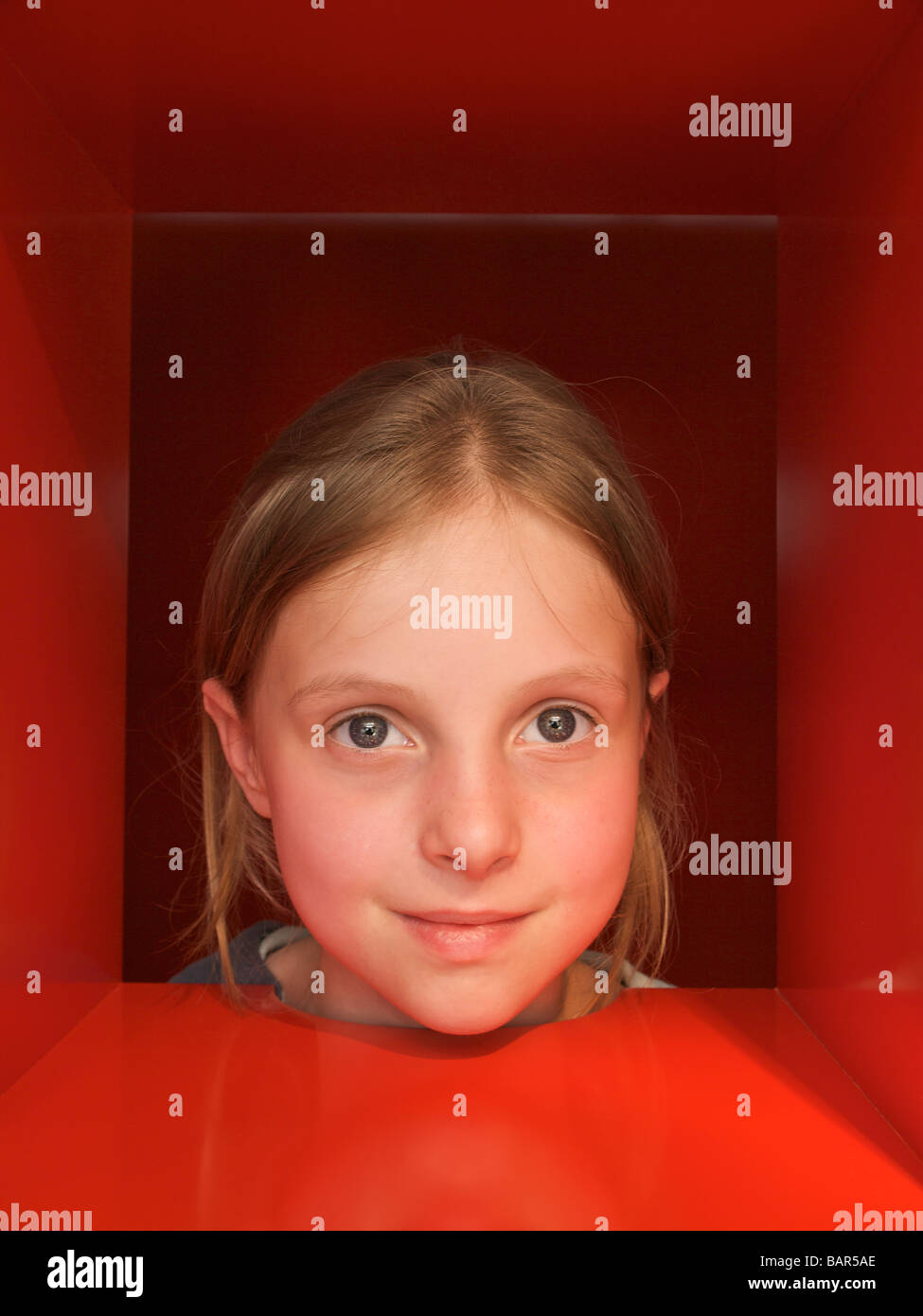 Little girl s head inside red box Her name is Lara she is 8 years old ...
