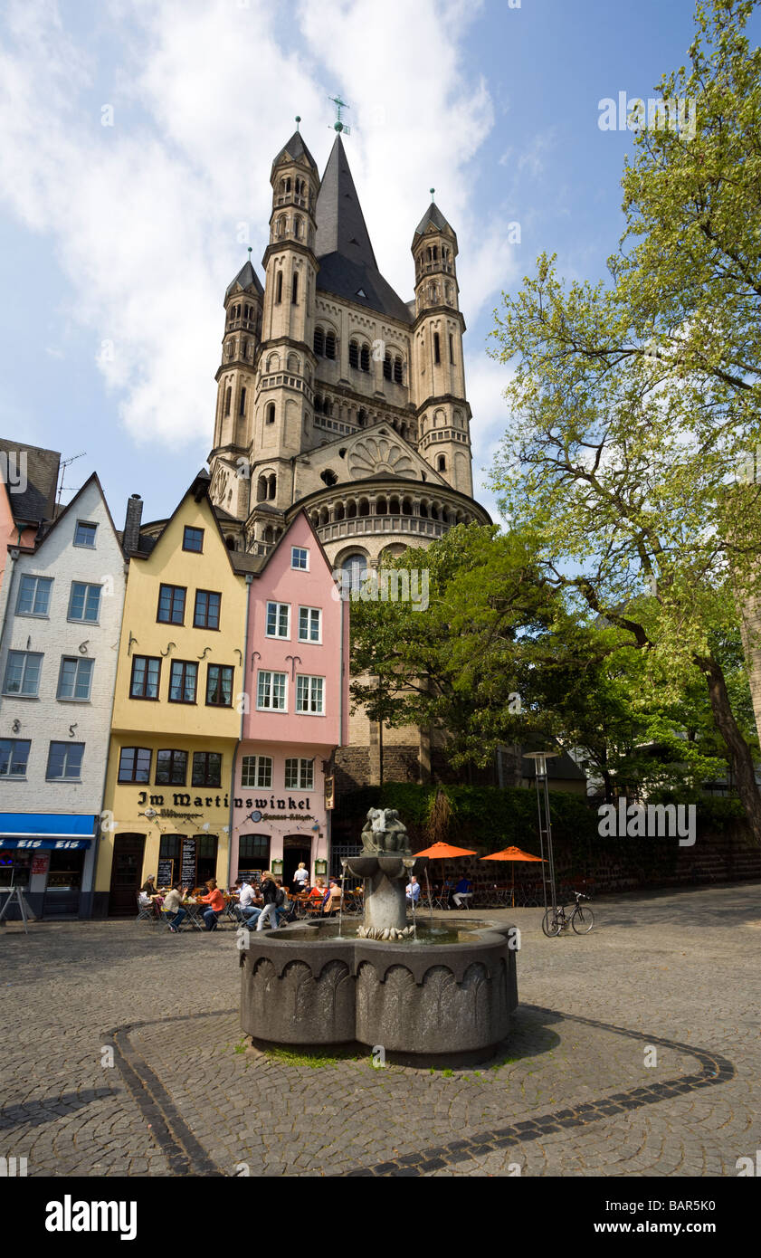 Fischmarkt at old town cologne, fountain in foreground, St. Martin ...