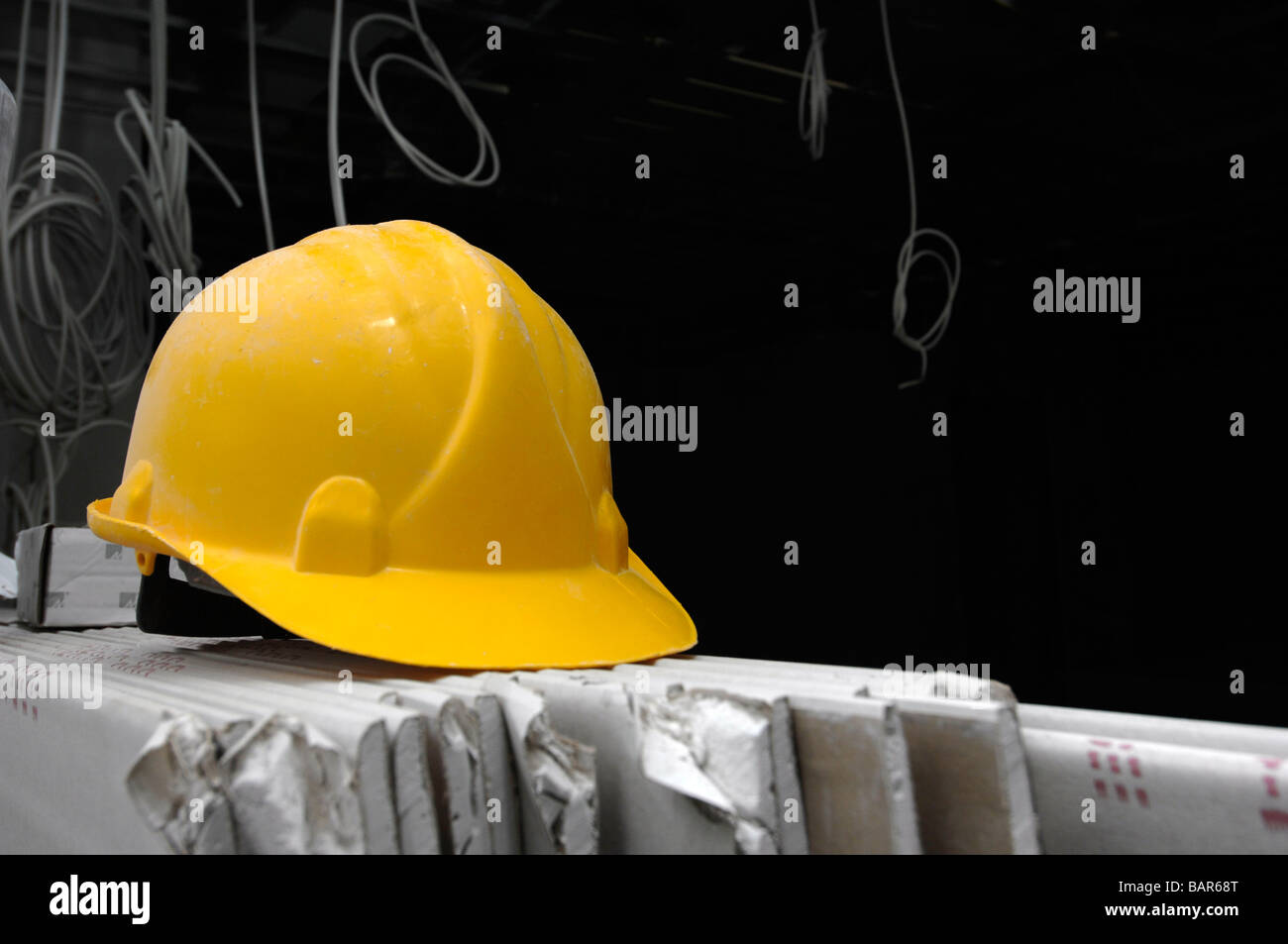 Hard hat on construction site, close-up Stock Photo - Alamy