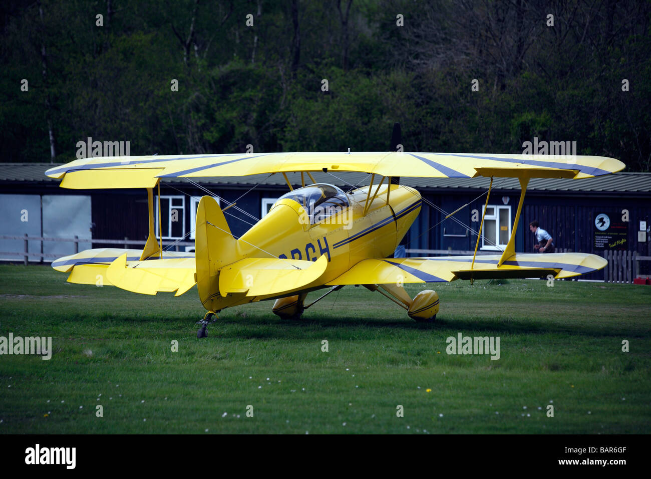 A yellow biplane at Popham airfield in Hampshire in England Stock Photo ...