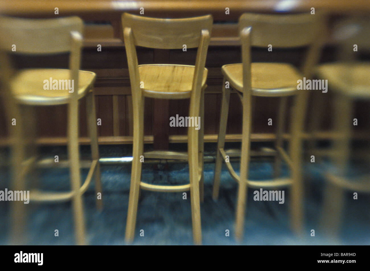 Bar stools in restaurant Stock Photo - Alamy