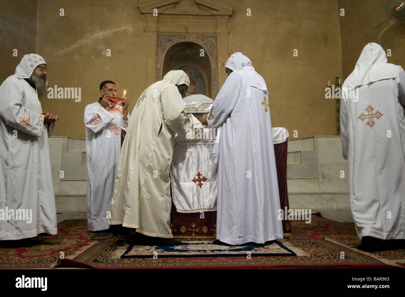 Coptic priests inside the Red Monastery Deir al Anba Bishoy or Bishai ...
