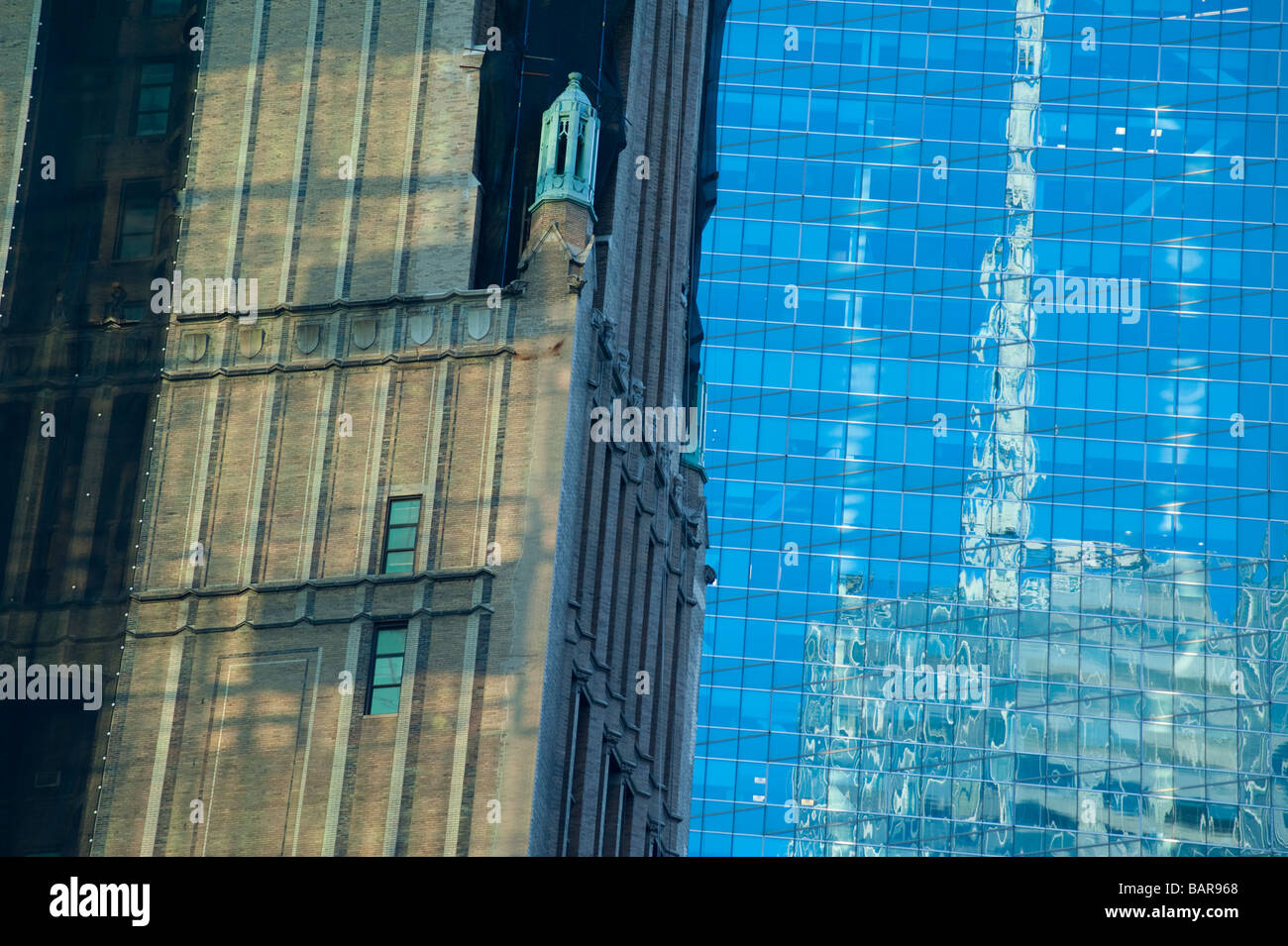 Urban buildings reflected in the glass windows of skyscrapers Stock ...