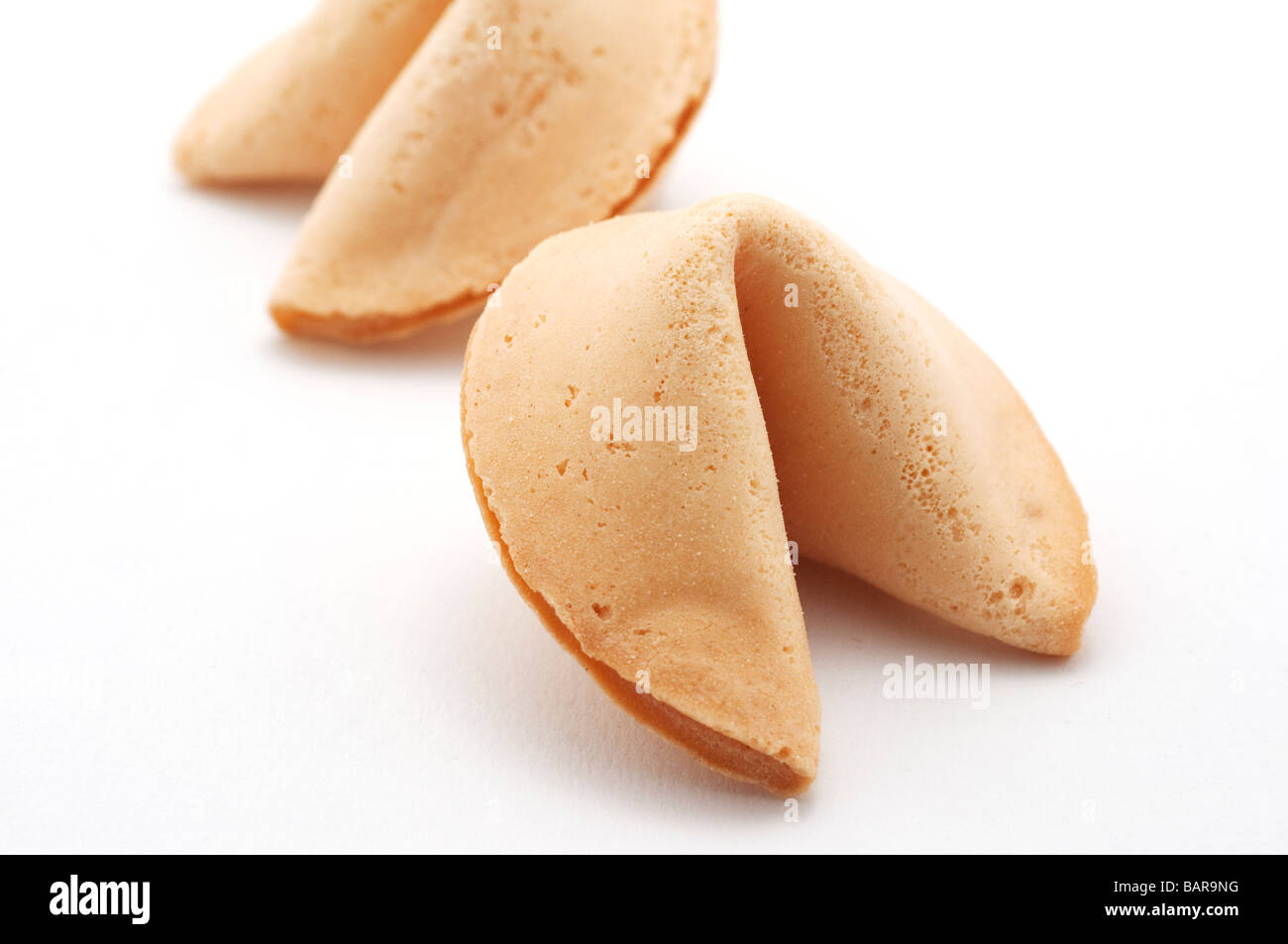 Fortune cookies on white background Stock Photo - Alamy