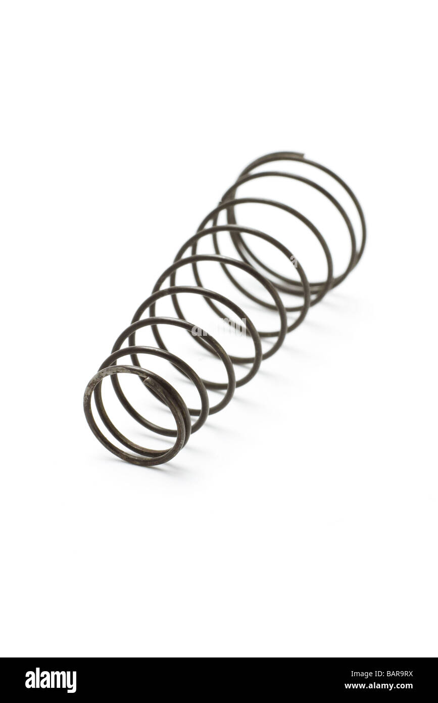 Close up of metal spring isolated on white background Stock Photo - Alamy