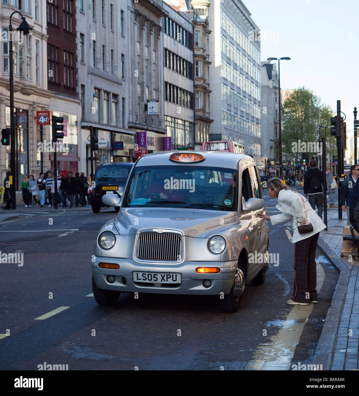 Silver taxi hi-res stock photography and images - Alamy