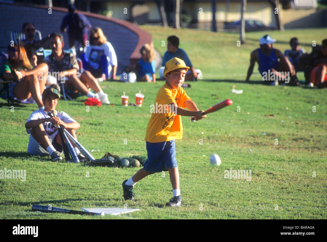 Young boy hit ball bat swing sport play baseball fun exercise health ...