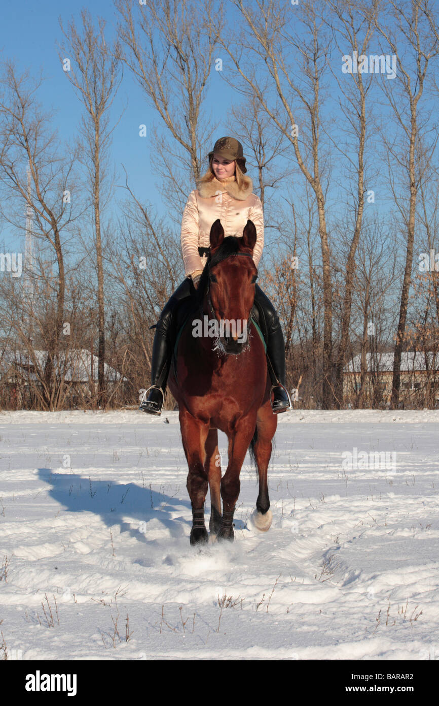 Woman riding horseback Stock Photo - Alamy