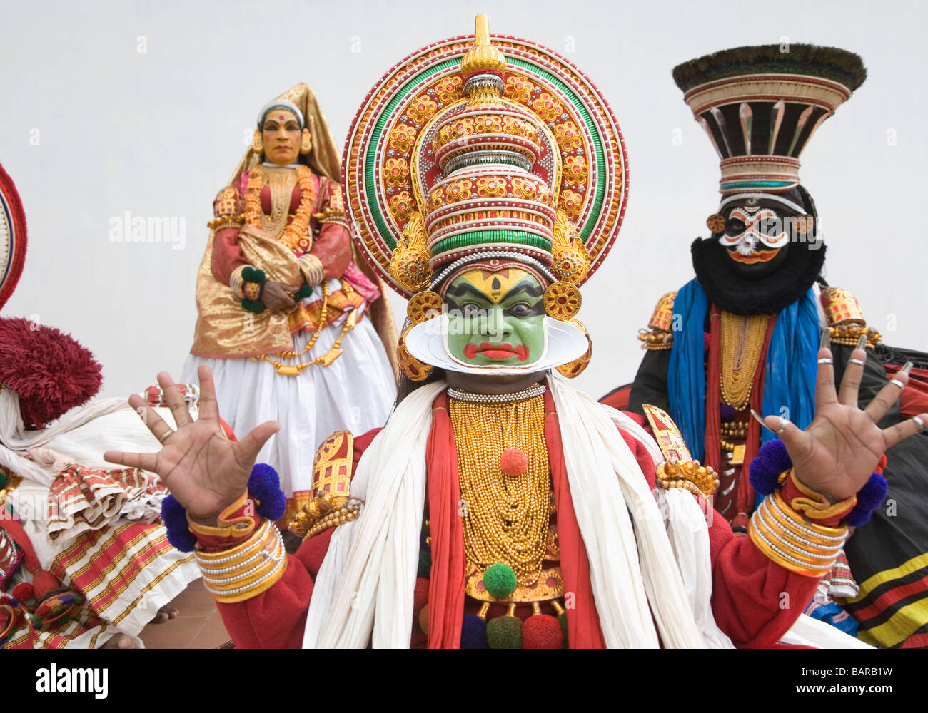 Four people kathakali dancing Stock Photo - Alamy