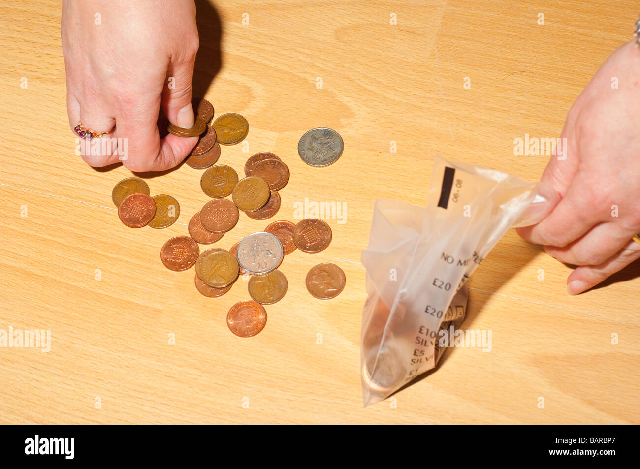 Counting money uk hi-res stock photography and images - Alamy