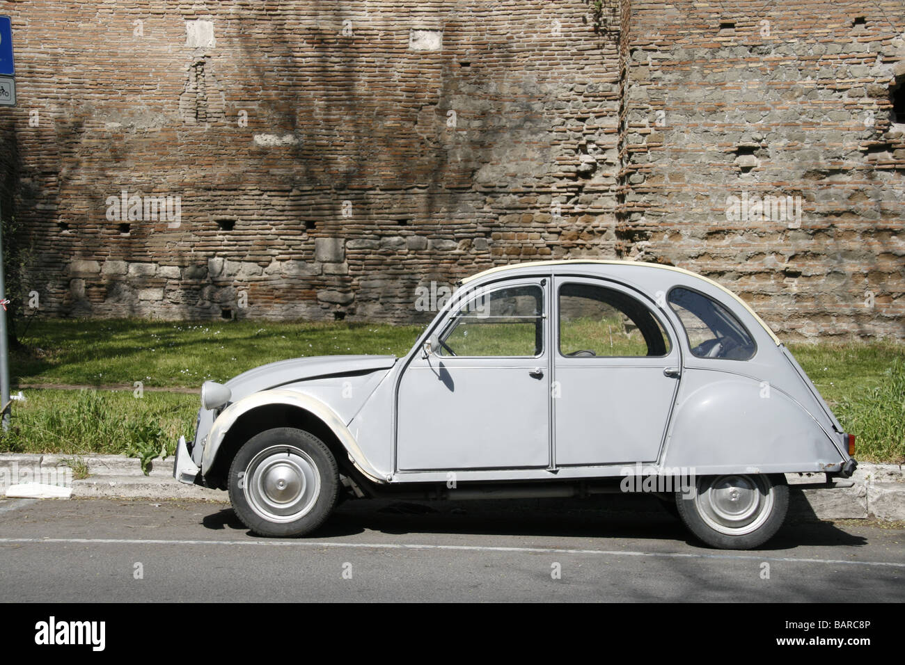 one citroen 2cv car by ancient roman aurelian defence wall in the ...