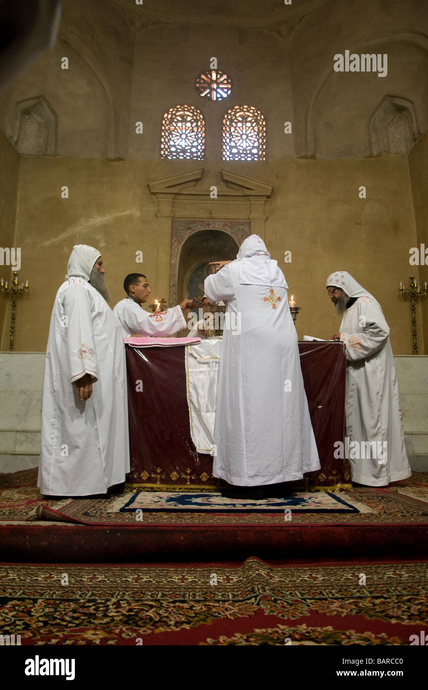 Coptic priests ritual process inside the Red Monastery Deir al Anba ...