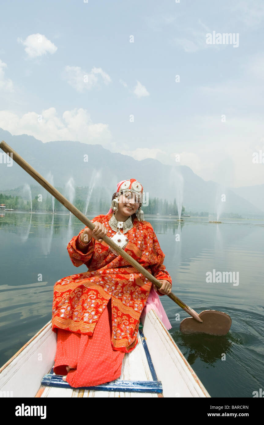 Woman rowing a shikara, Dal Lake, Srinagar, Jammu And Kashmir, India ...