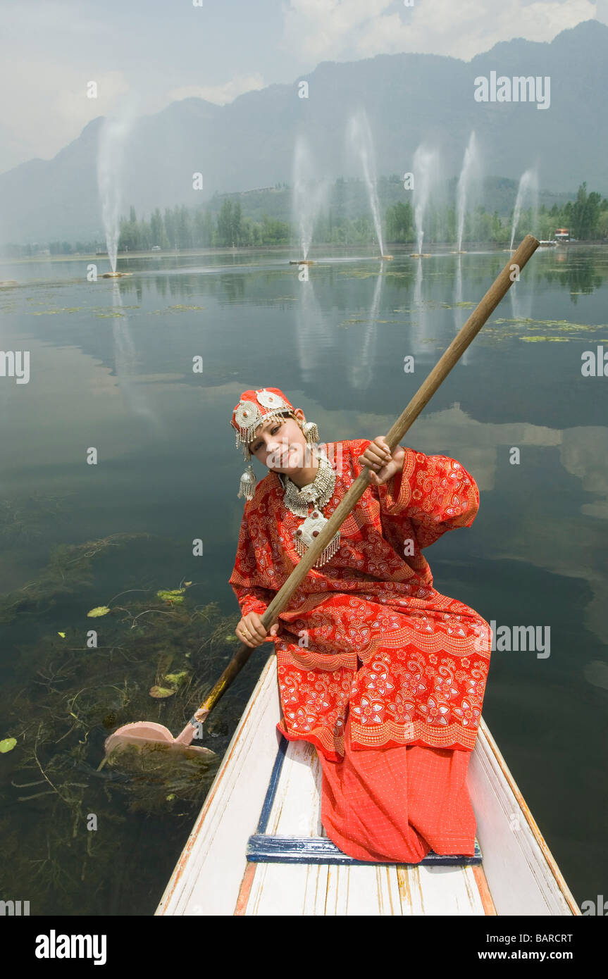 Woman rowing a shikara, Dal Lake, Srinagar, Jammu And Kashmir, India ...