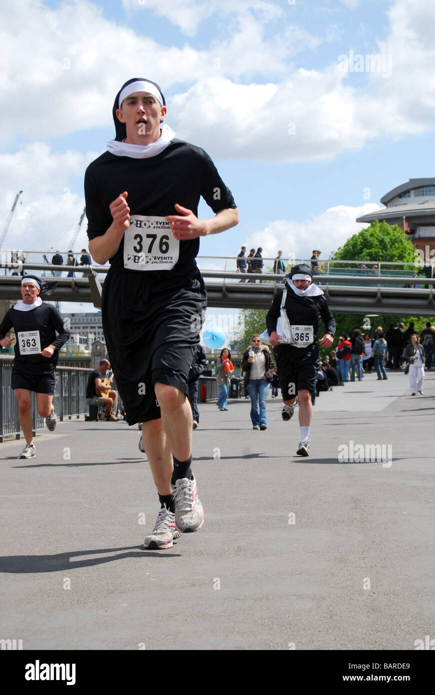 Nun Fun Run Habit London Barnado's Charity Stock Photo - Alamy