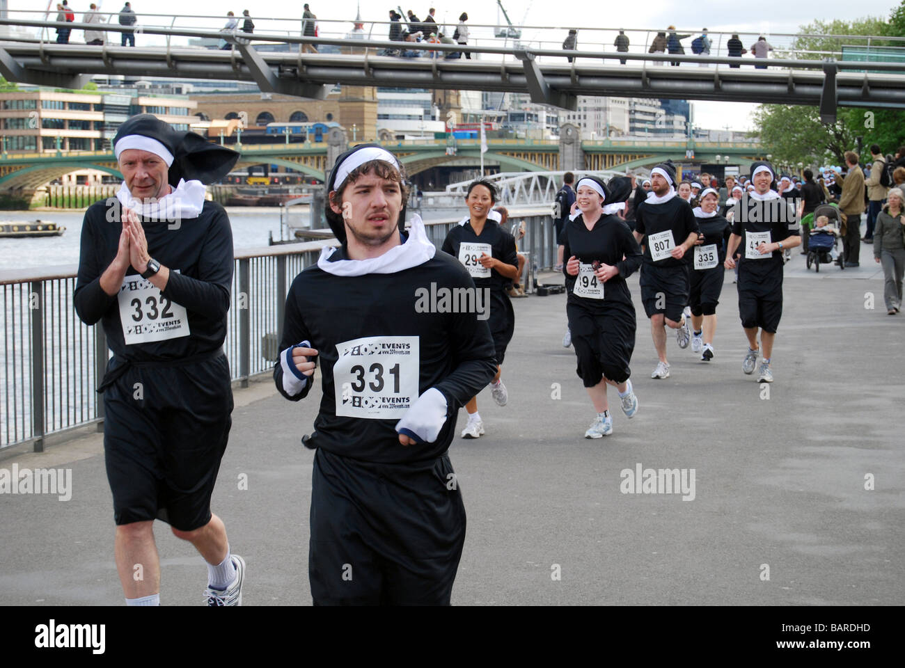 Nun Fun Run Habit London Barnardo's charity Stock Photo - Alamy