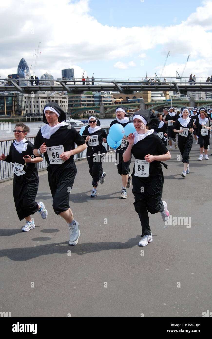 Nun Fun Run Habit London Barnardo's charity Stock Photo - Alamy