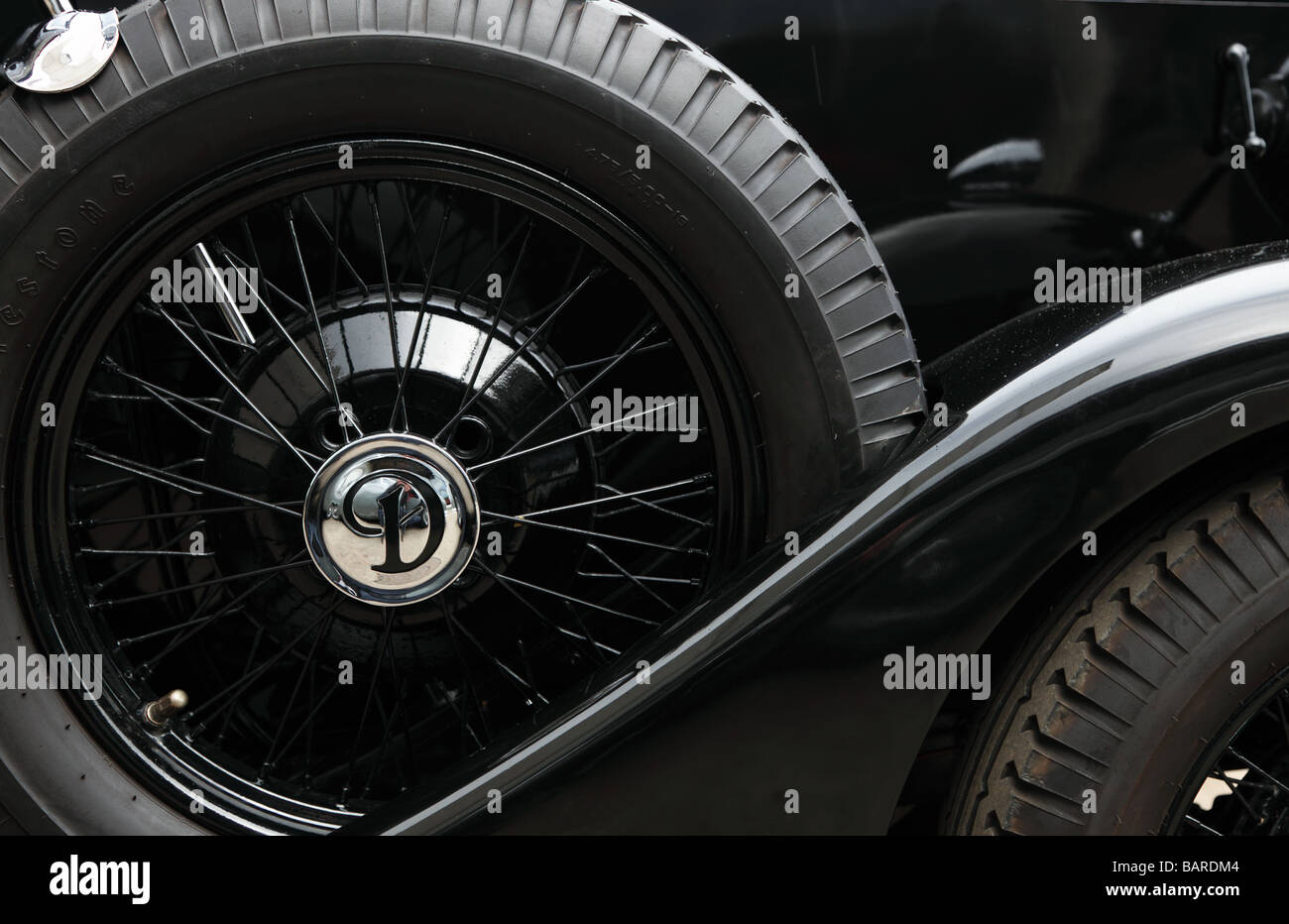 Spare wheel and tyre mounted on the offside wing of a 1932 Cleghorn ...
