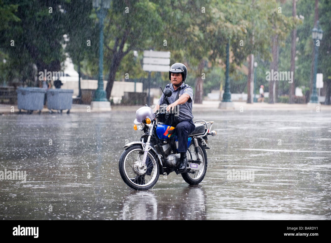 Motorbike Riding In Rain
