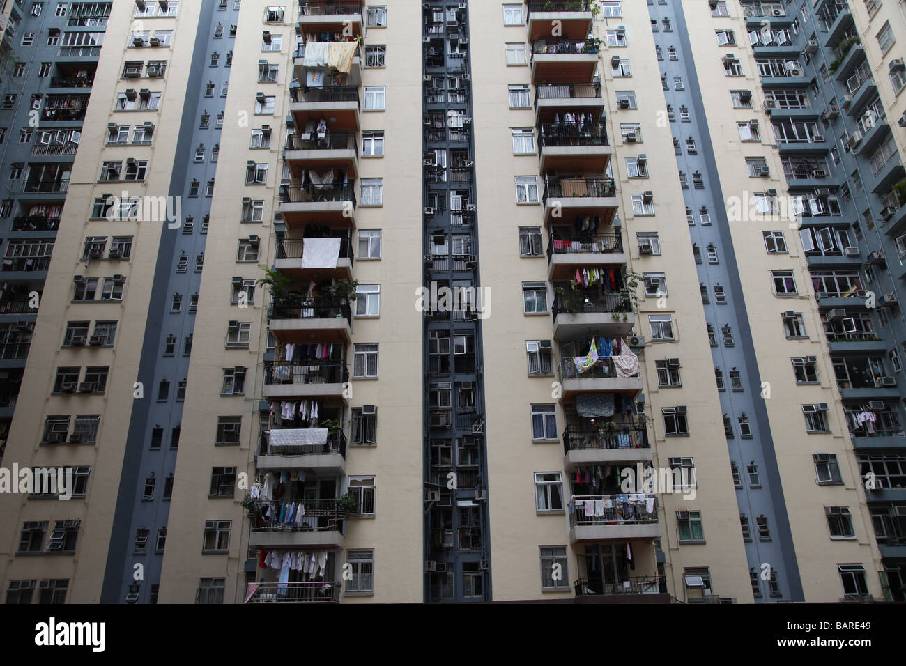 tower building with balcony in old hong kong. It's high tower in ...