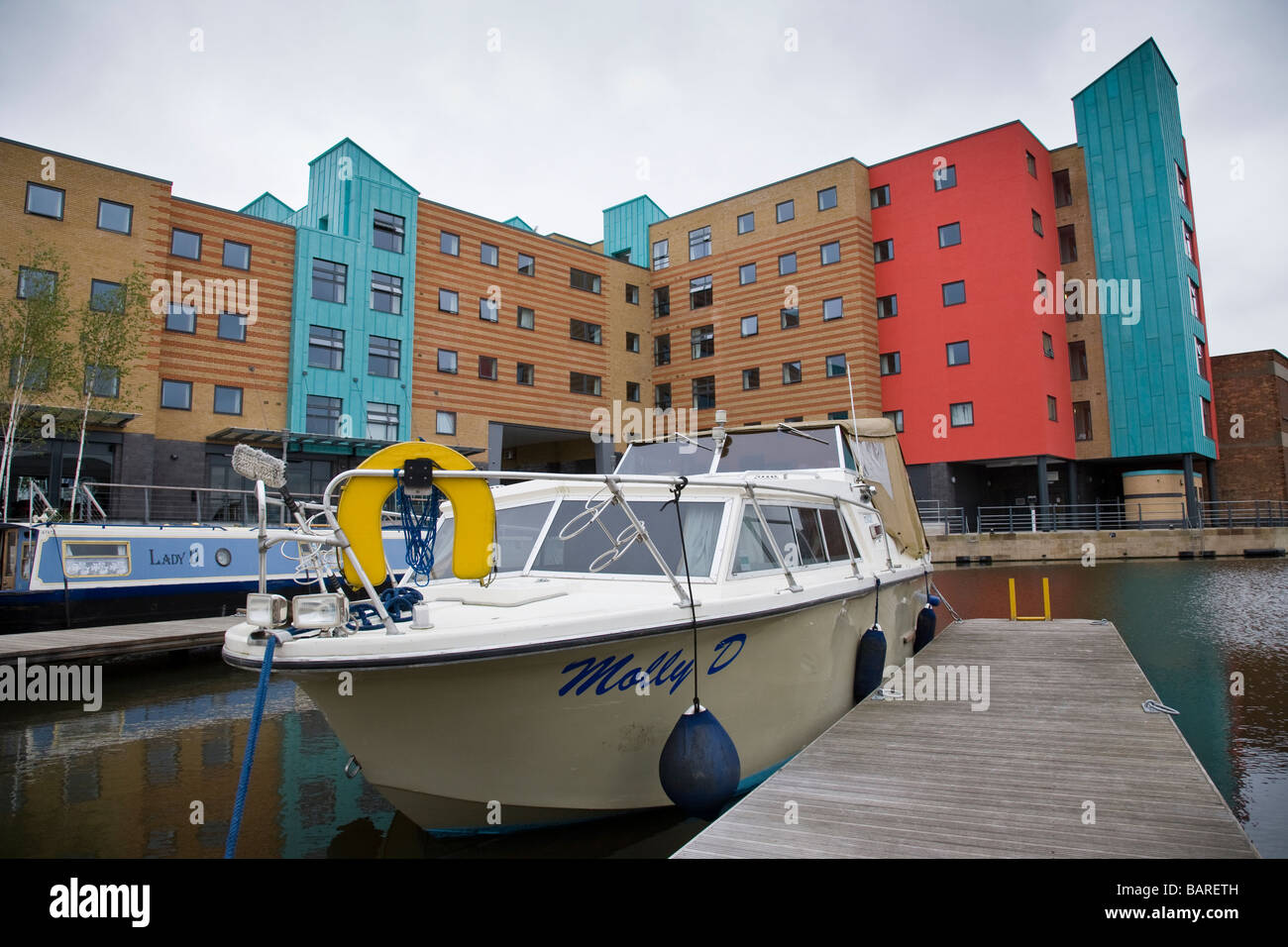 Modern student apartment block forms the backdrop to a wharf on the ...