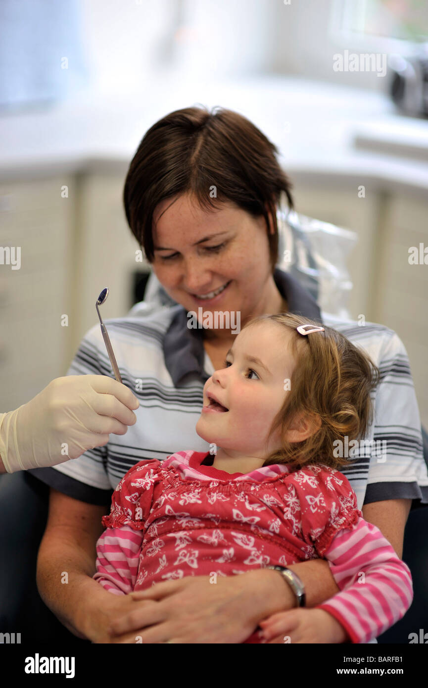 mother and daughter first visit to the dentist Stock Photo - Alamy