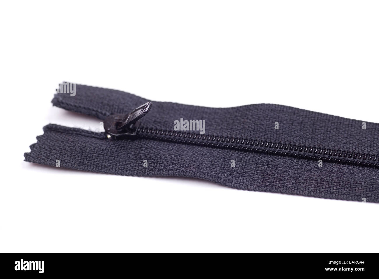 Close up of a black zipper against a white background Stock Photo - Alamy