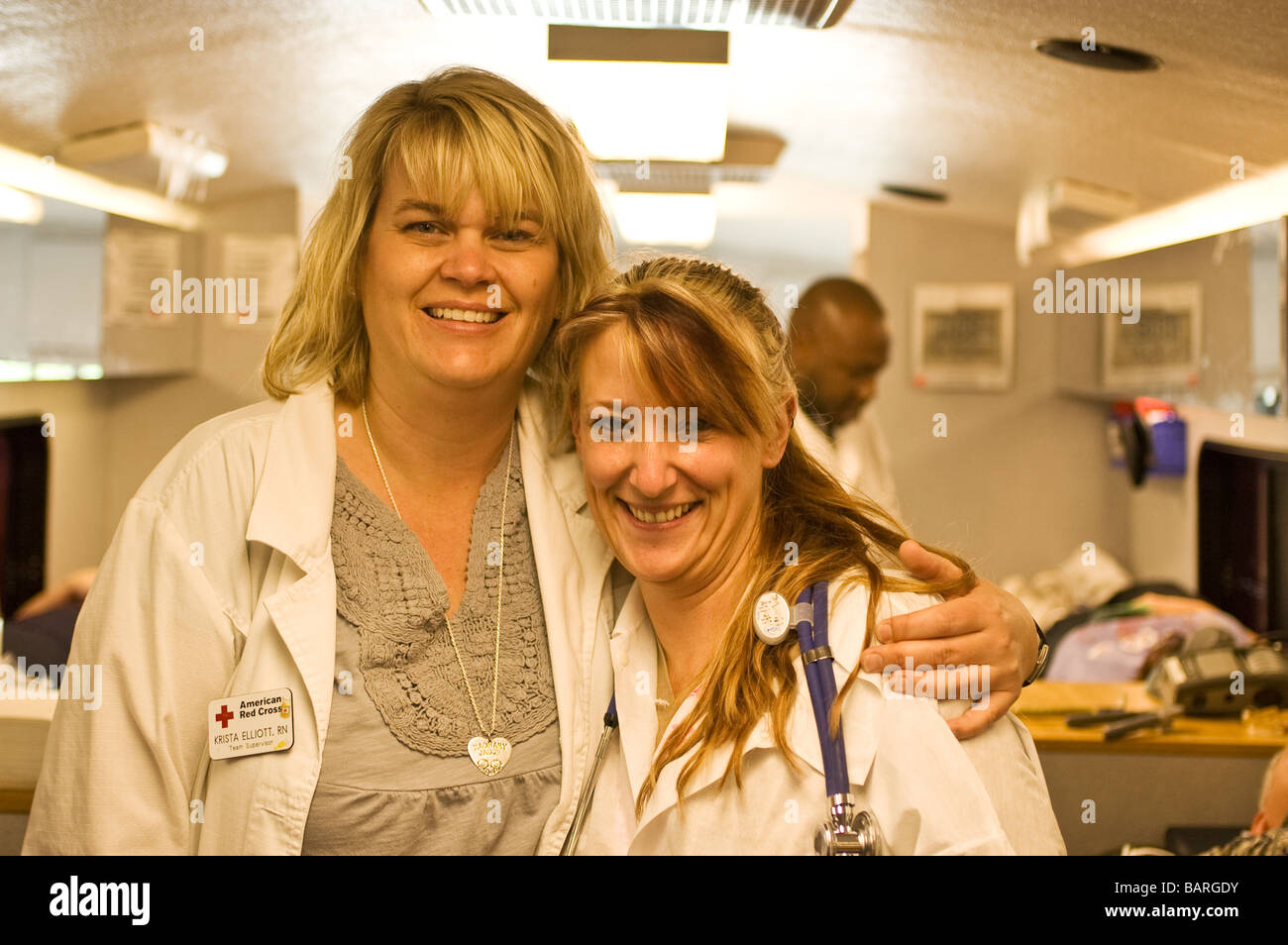An RN and a blood tech in their Red Cross blood mobile, University ...