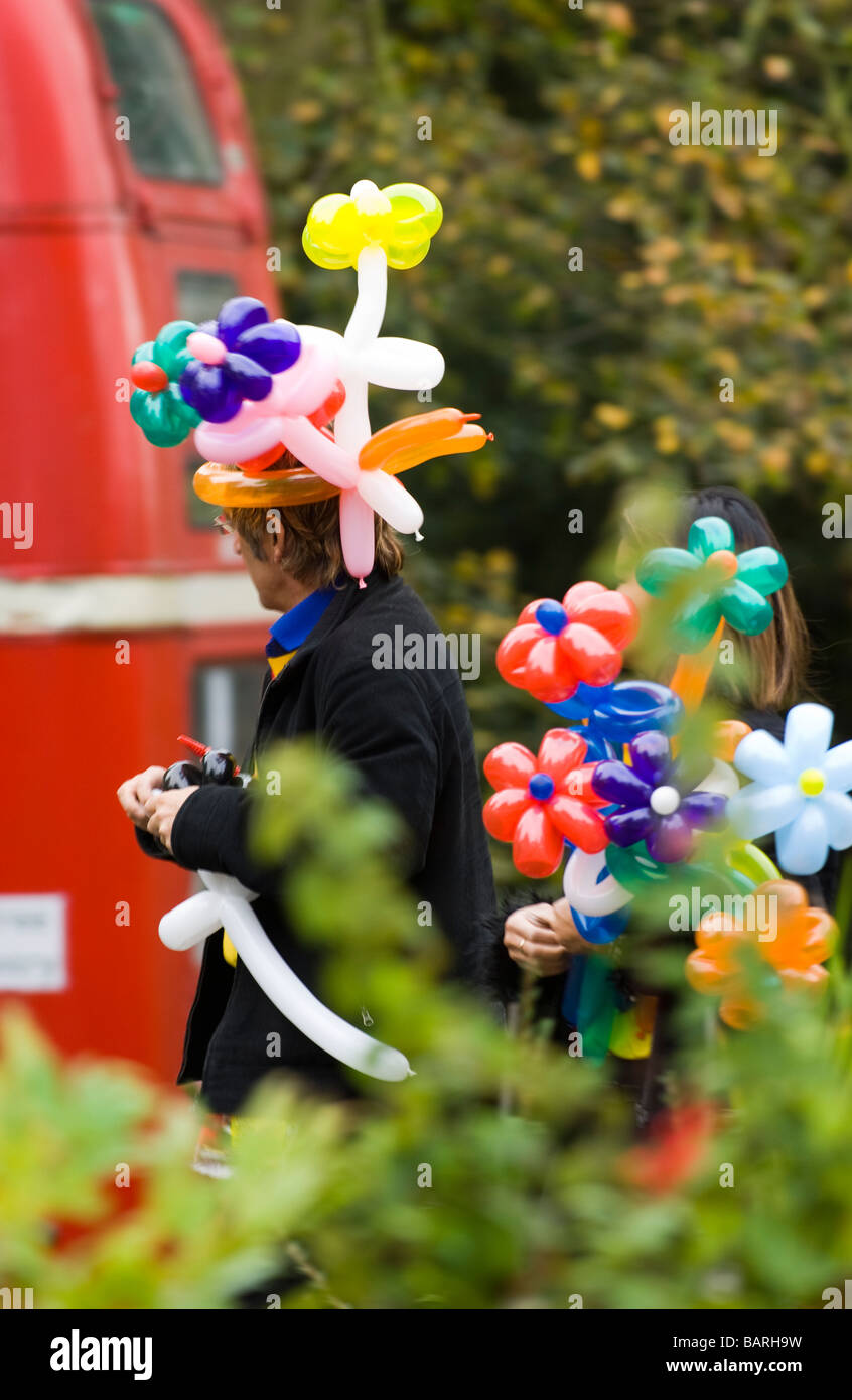 Balloon man with lots of balloons Stock Photo - Alamy