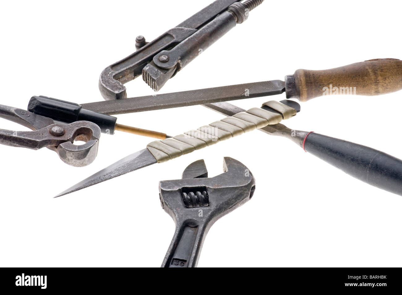 object on white instrument and adjustable spanner close up Stock Photo ...