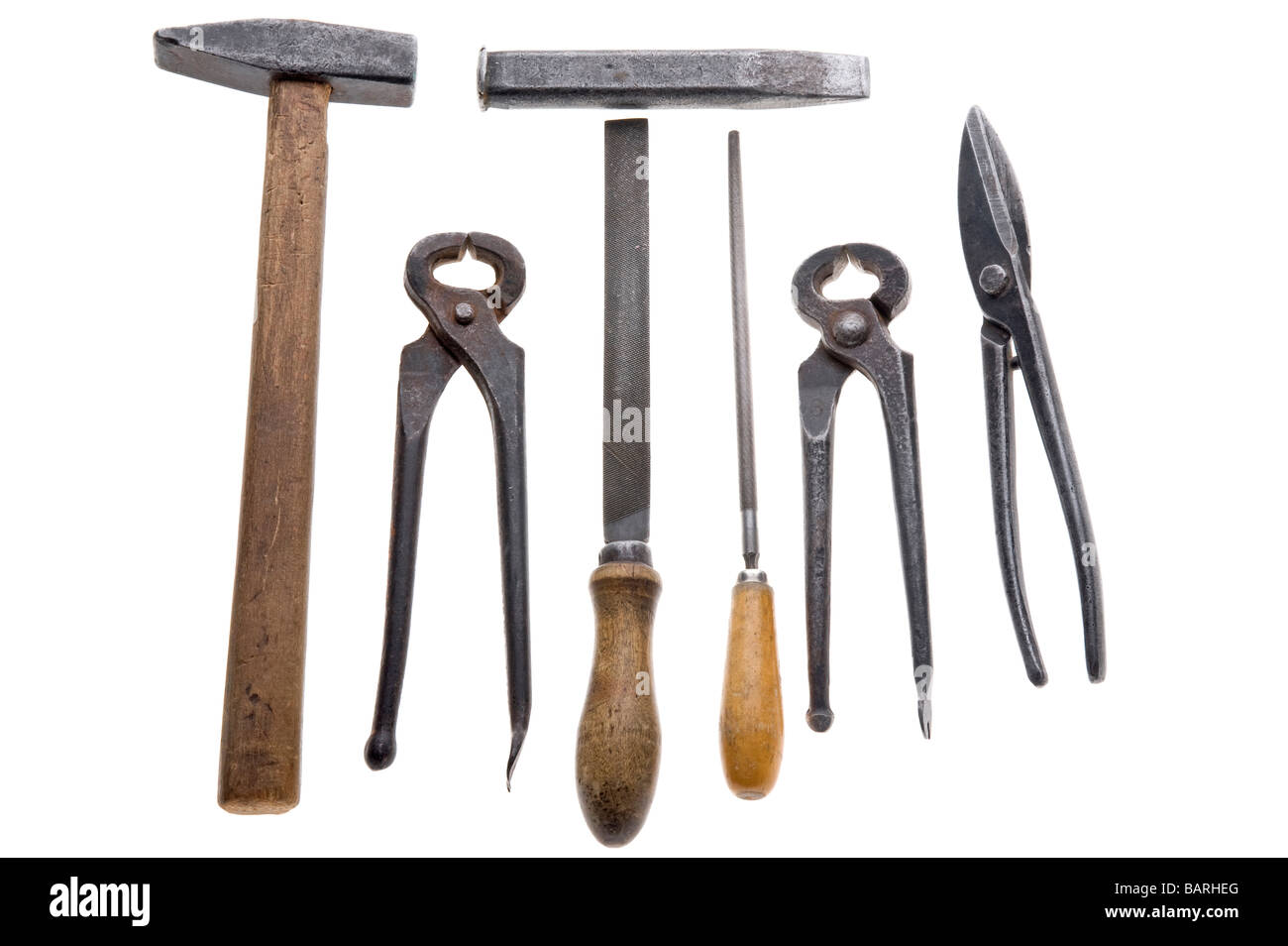 object on white instrument and round pliers close up Stock Photo - Alamy