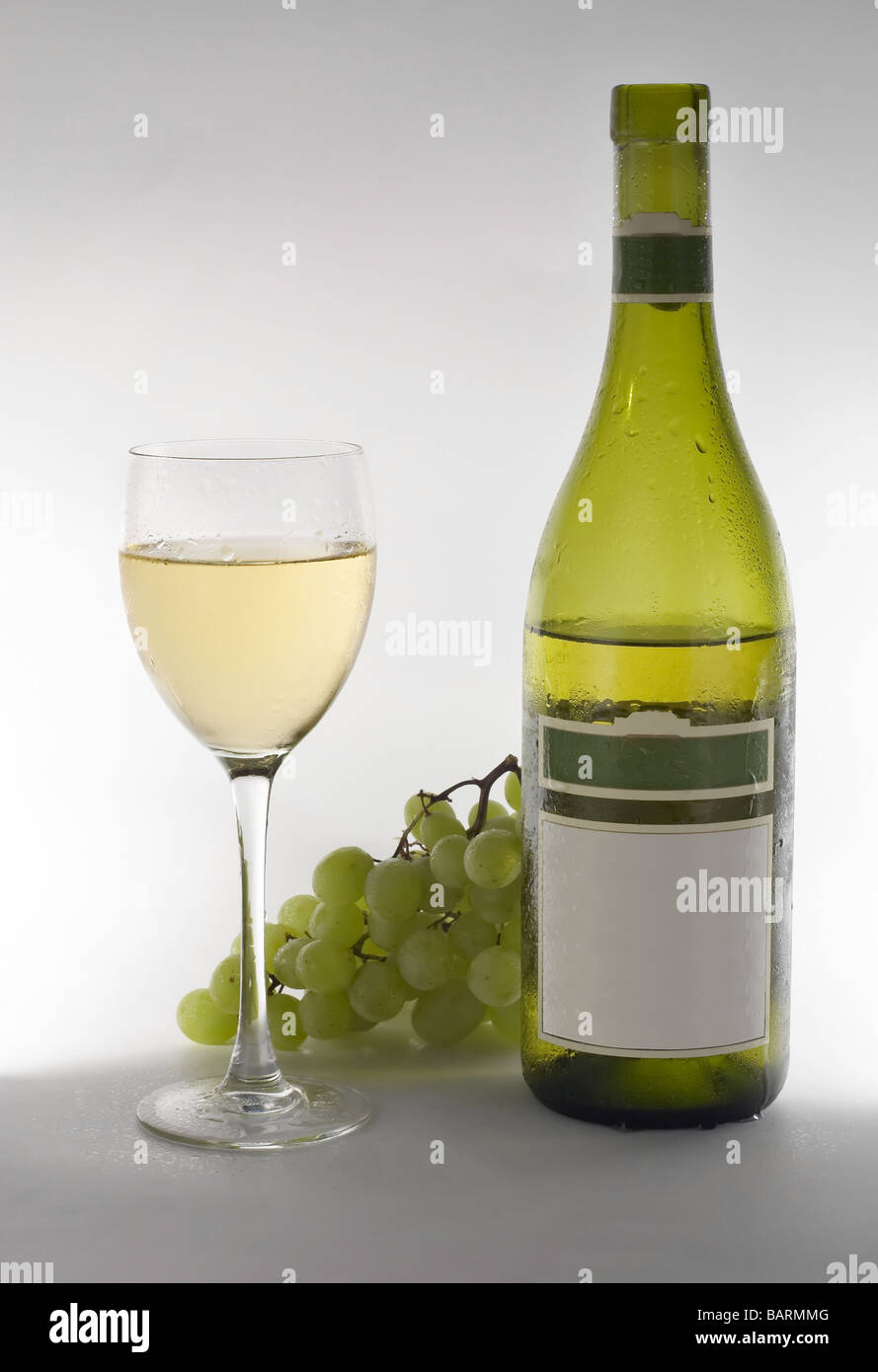 white wine grapes and bottle with blanco label Stock Photo - Alamy