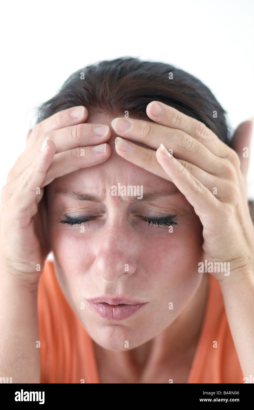 Young woman is having a bad headache Stock Photo - Alamy