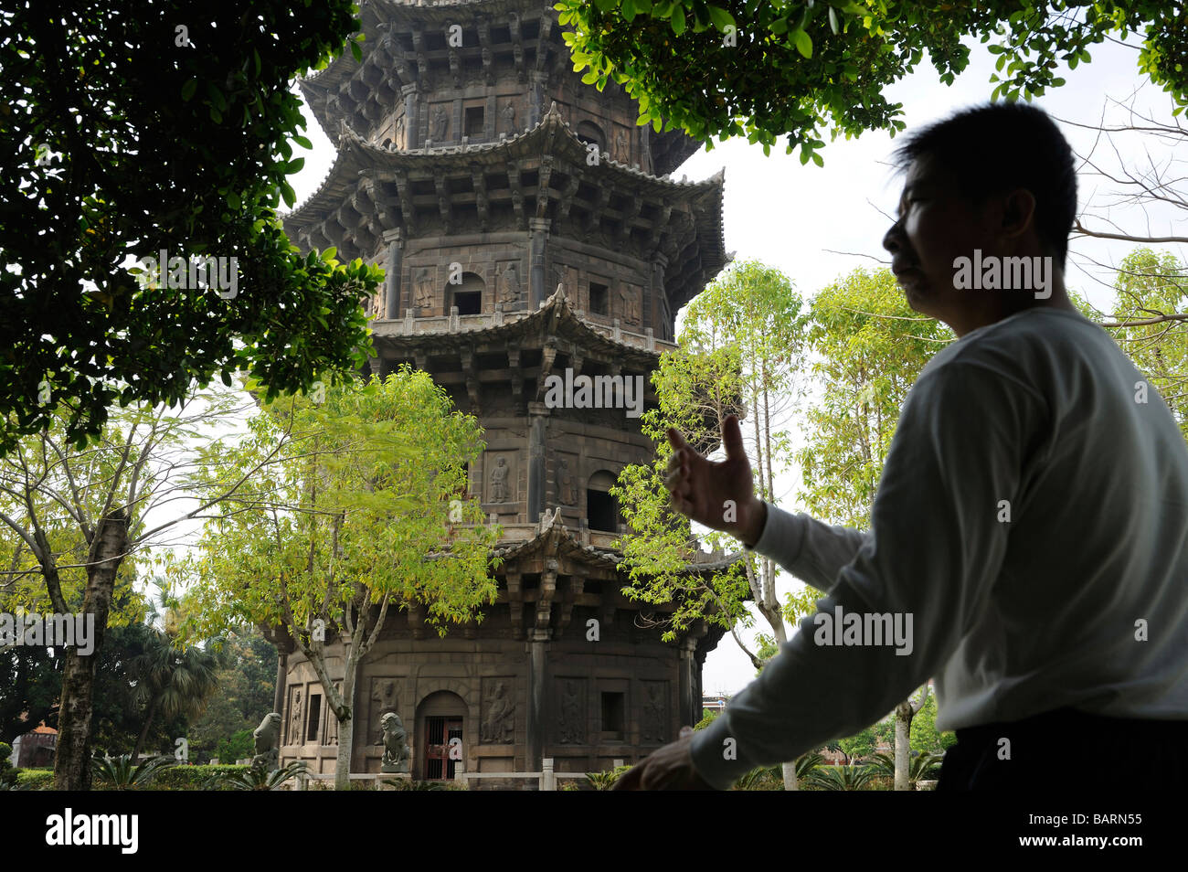 Chinese man practicing Taiji in early morning at Kaiyuan Temple in ...