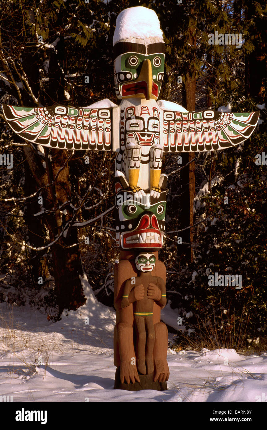 Snow Covered Kwakwaka'wakw (Kwakiutl) Totem Pole in Winter at Brockton ...