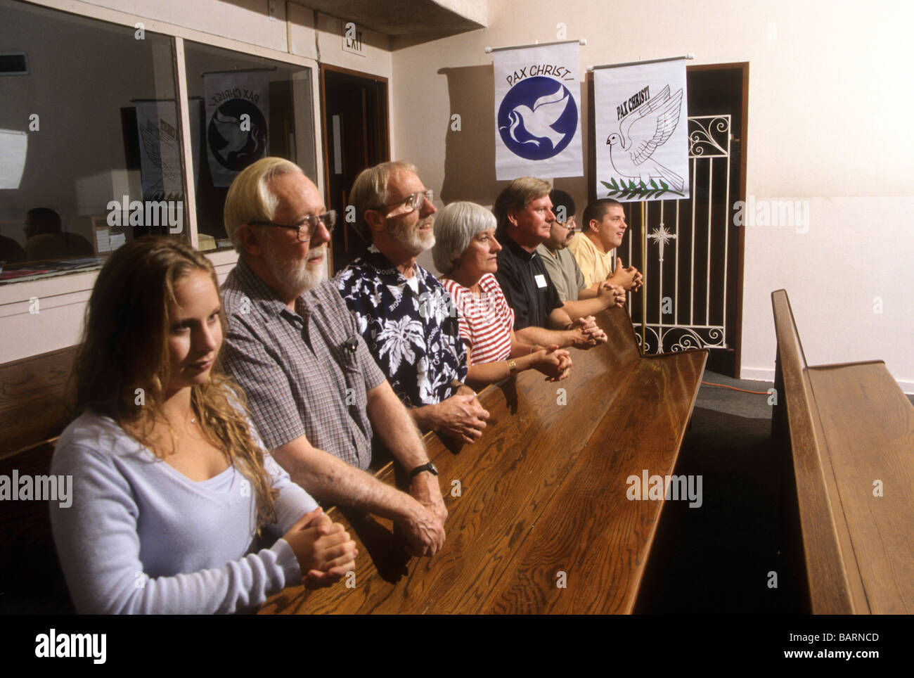 Church group Pax Christi Catholic pray religion hold hand Stock Photo ...