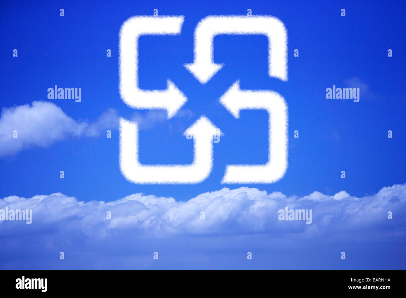 Recycle symbol in blue sky with clouds Stock Photo - Alamy