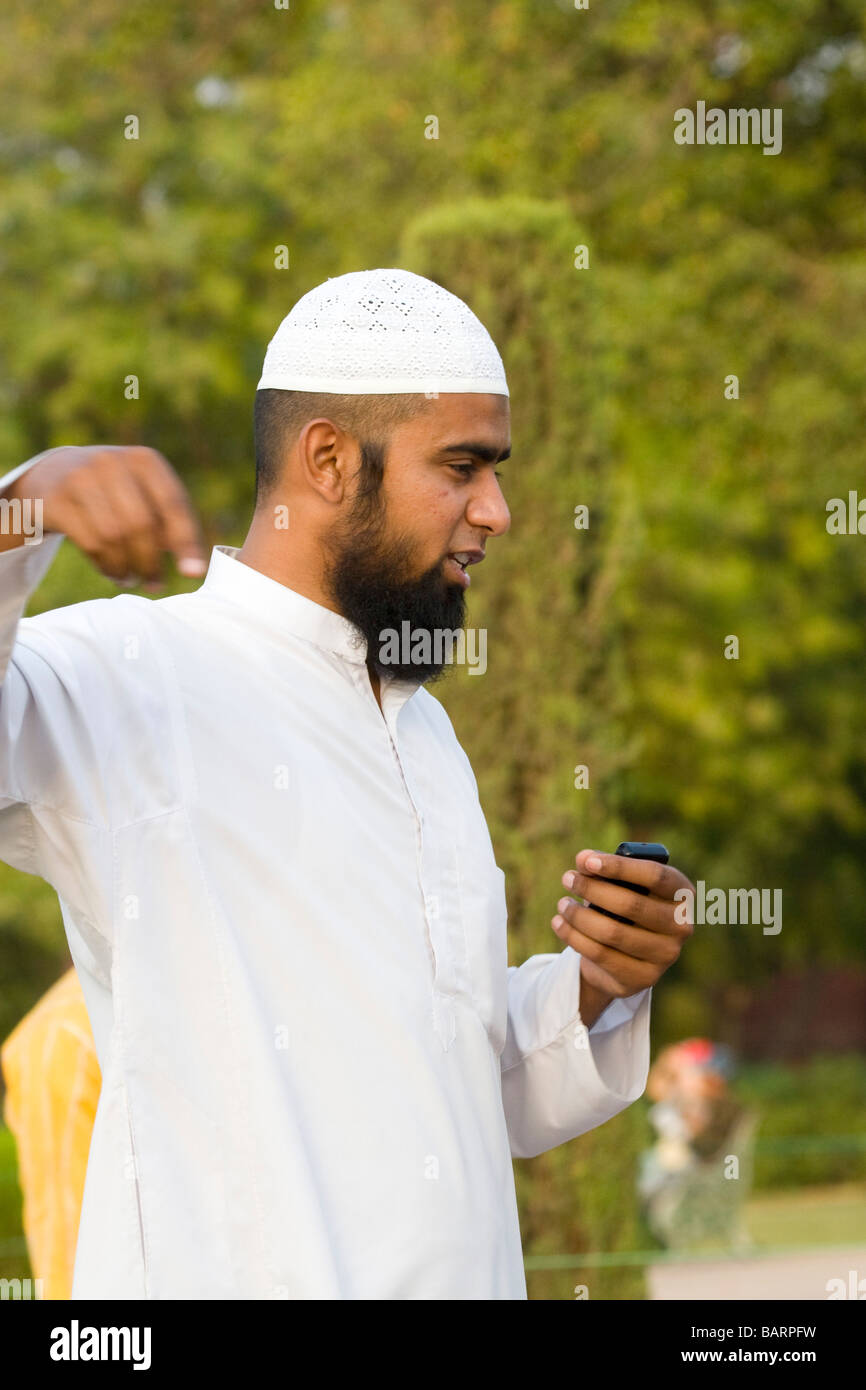 India Uttar Pradesh Agra The Taj Mahal Local man in traditional clothes ...