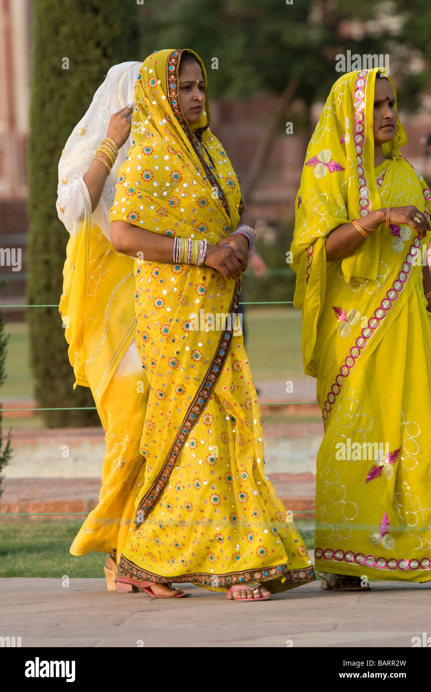 India Uttar Pradesh Agra The Taj Mahal Local woman in traditional sari ...