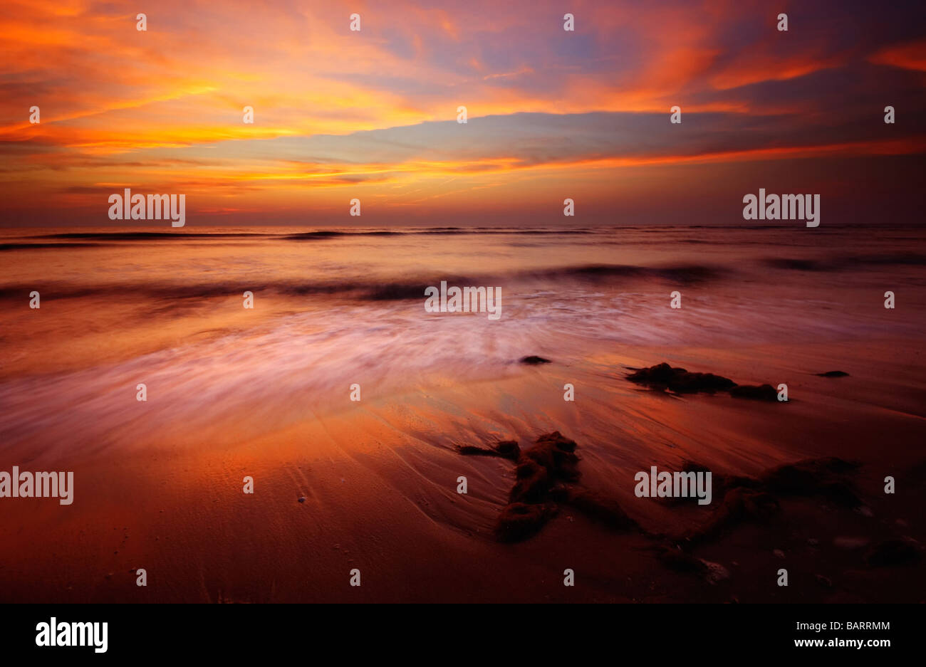 Beautiful sunset and waves on the beach in Zandvoort Holland The ...