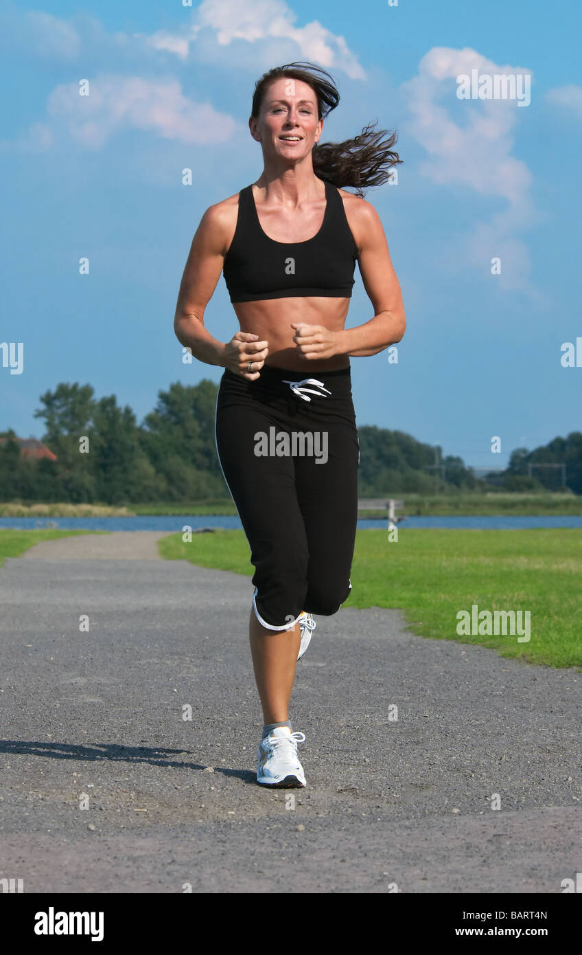 woman running outdoor Stock Photo - Alamy