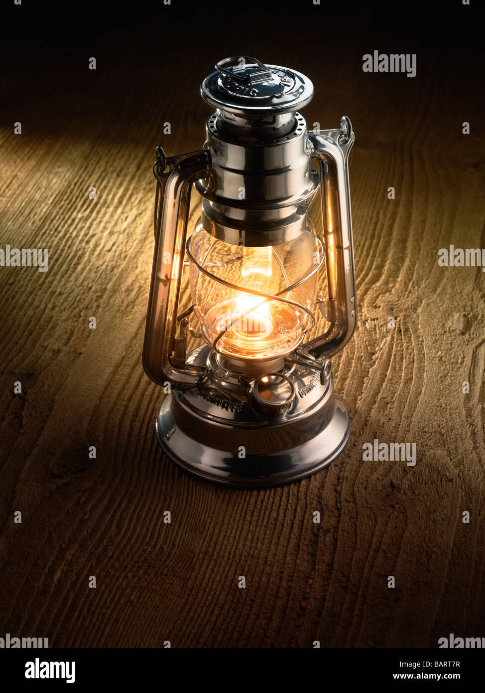 oil lamp on wood background Stock Photo - Alamy