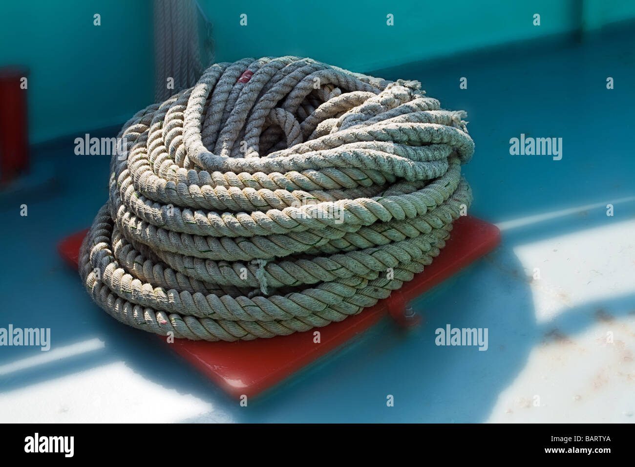 Coiled rope on bow of Sliema Valletta ferry, with out of focus ...