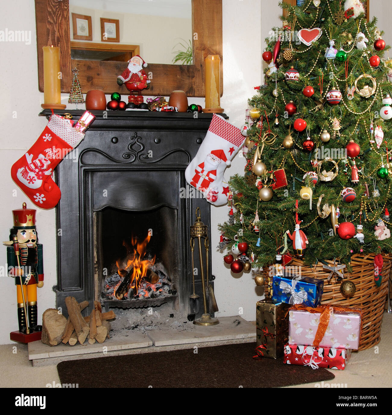 Christmas stockings and log fire hi-res stock photography and images ...